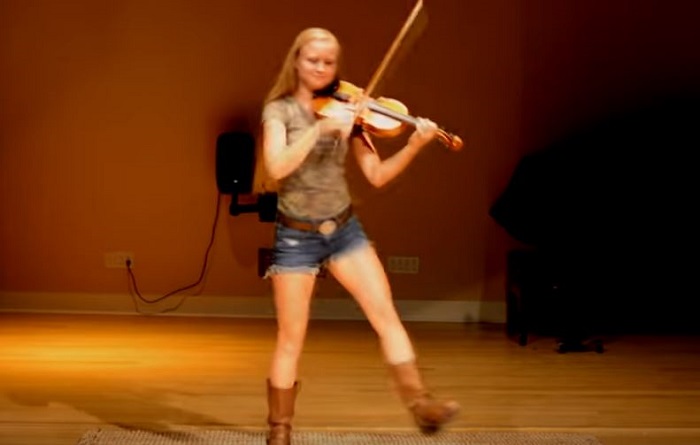 Girls impressive foot skills take her fiddle playing to the next level