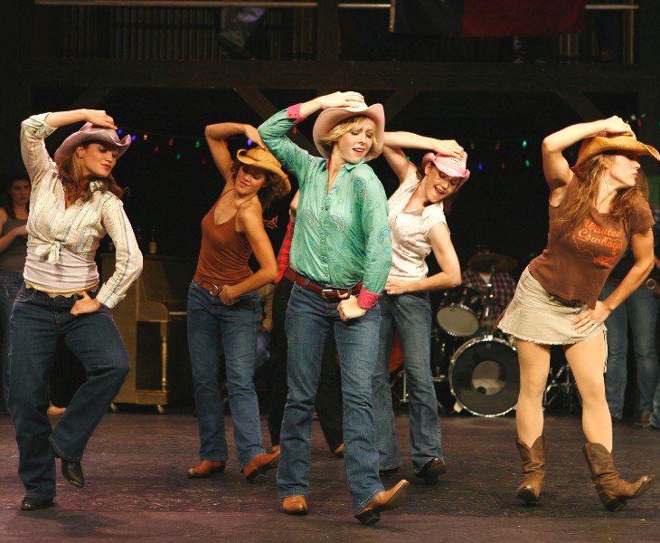 Couple shakes up dance floor with their gravity-defying country swing ...