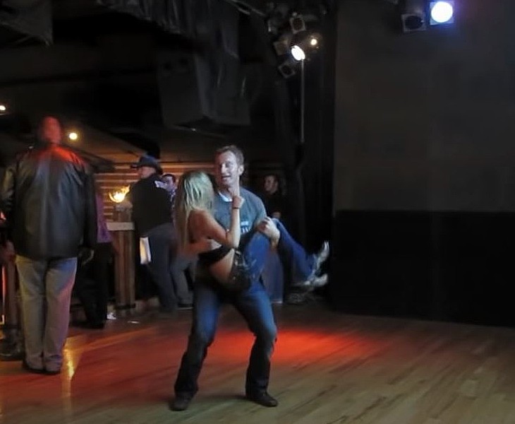 Couple shakes up dance floor with their gravity-defying country swing ...