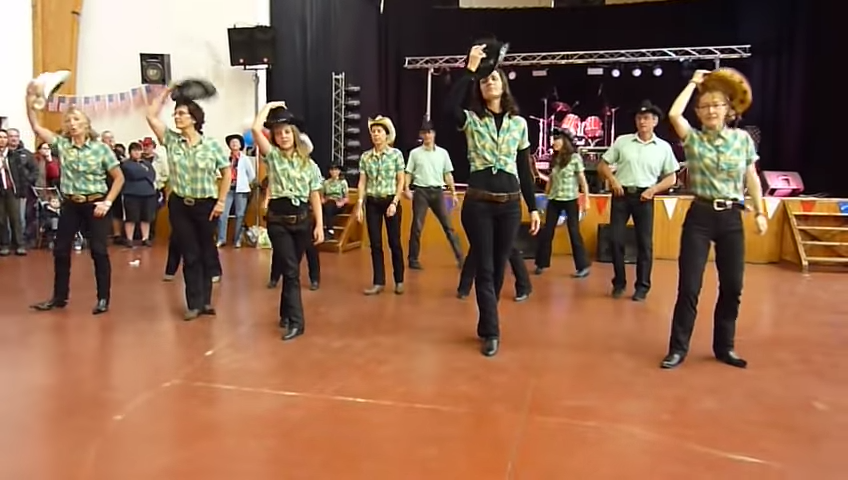 10 Dancers Light Up Floor With Fun “Country Roads” Line Dance